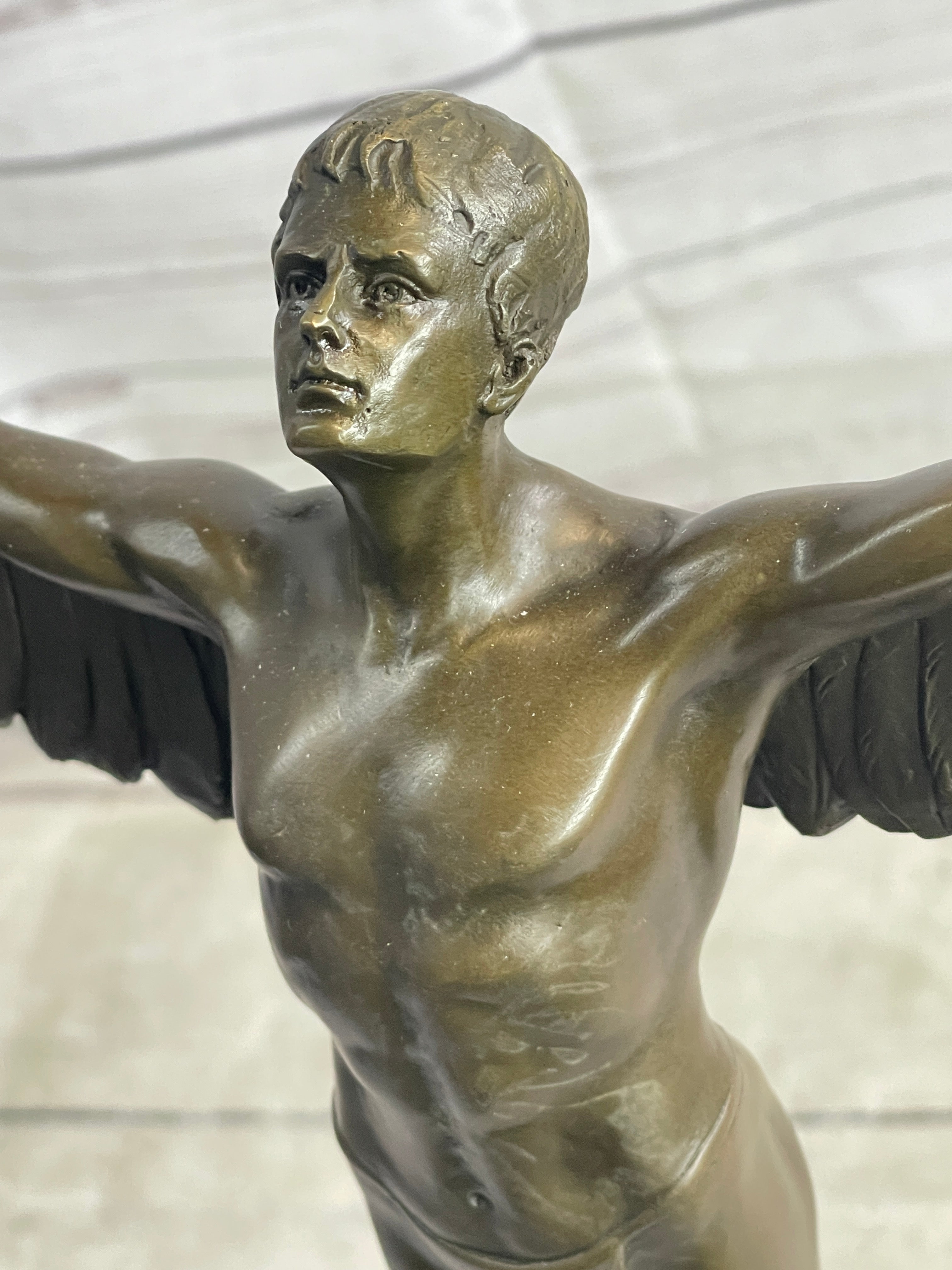 Icarus Falling Statue